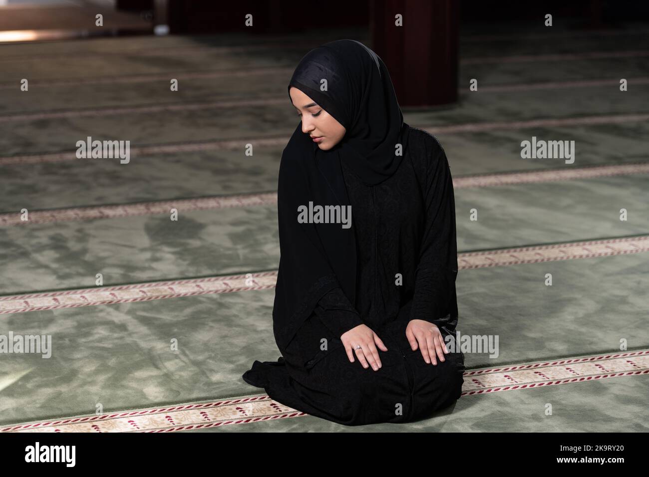 Muslim Woman Who is Wearing the Islamic Long Hijab Khimar Was Praying ...