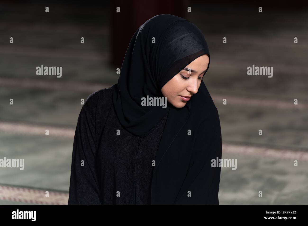 Muslim Woman in Beige Hijab and Traditional Clothes Praying for Allah ...