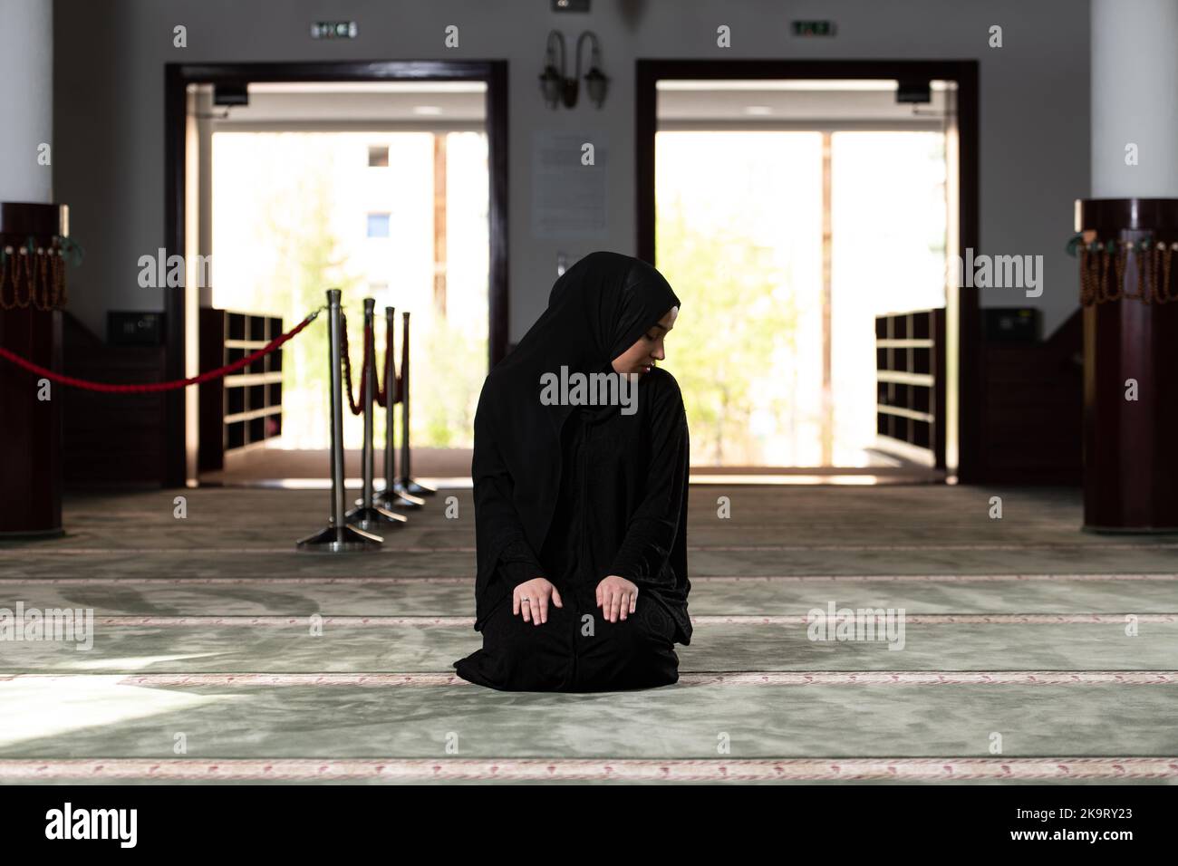 Muslim Woman Who is Wearing the Islamic Long Hijab Khimar Was Praying ...