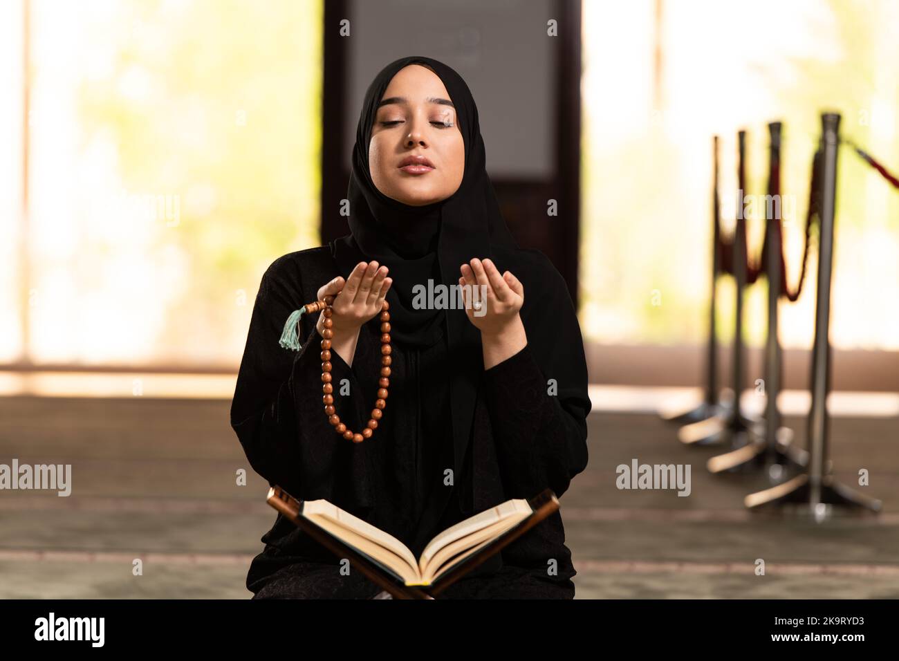 Humble Muslim Woman Holding Hands Up and Praying in Peace Stock Photo ...