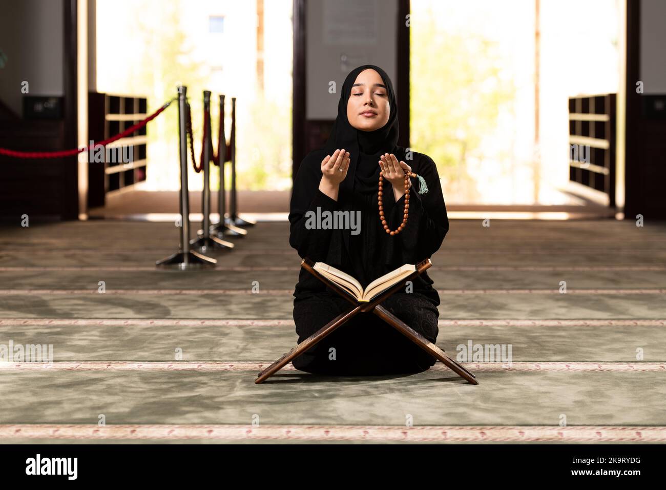 Humble Muslim Woman Holding Hands Up and Praying in Peace Stock Photo ...