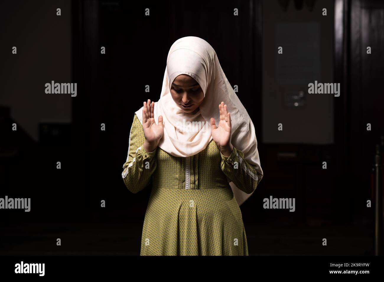Muslim Woman Who is Wearing the Islamic Long Hijab Khimar Was Praying ...