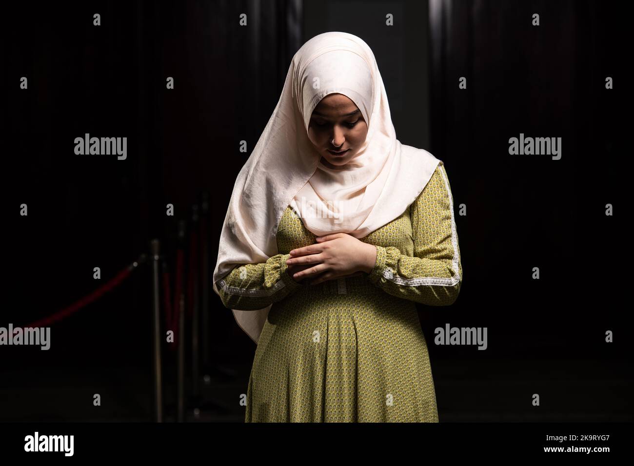 Muslim Woman Who is Wearing the Islamic Long Hijab Khimar Was Praying ...