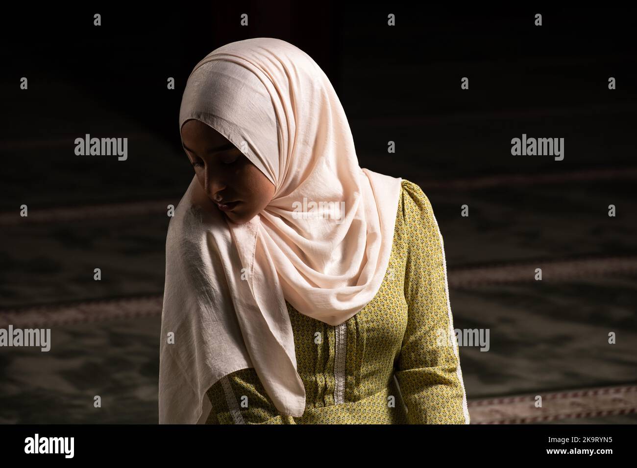 Muslim Woman Who is Wearing the Islamic Long Hijab Khimar Was Praying ...