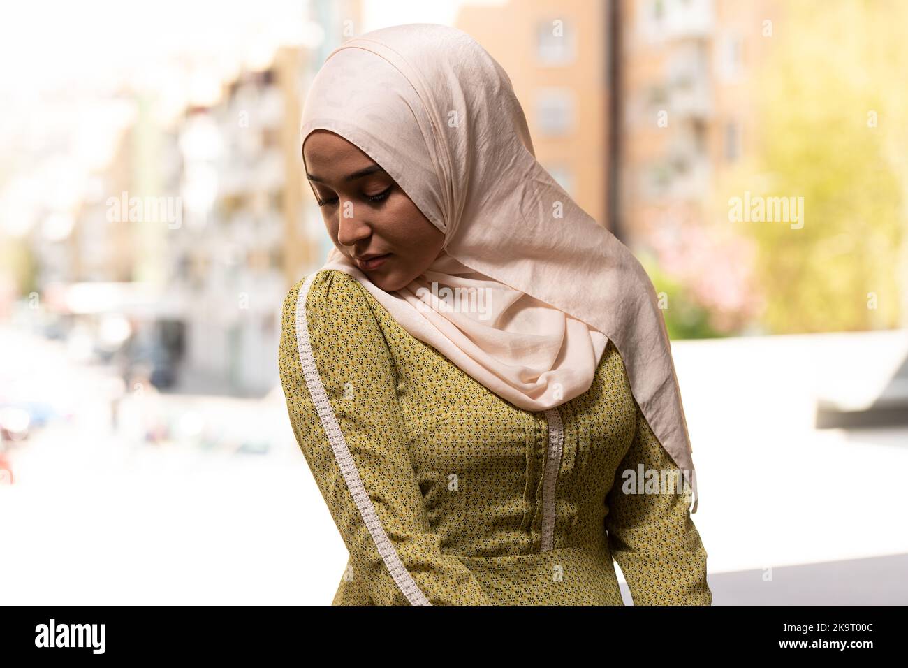 Muslim Woman in Beige Hijab and Traditional Clothes Praying for Allah ...