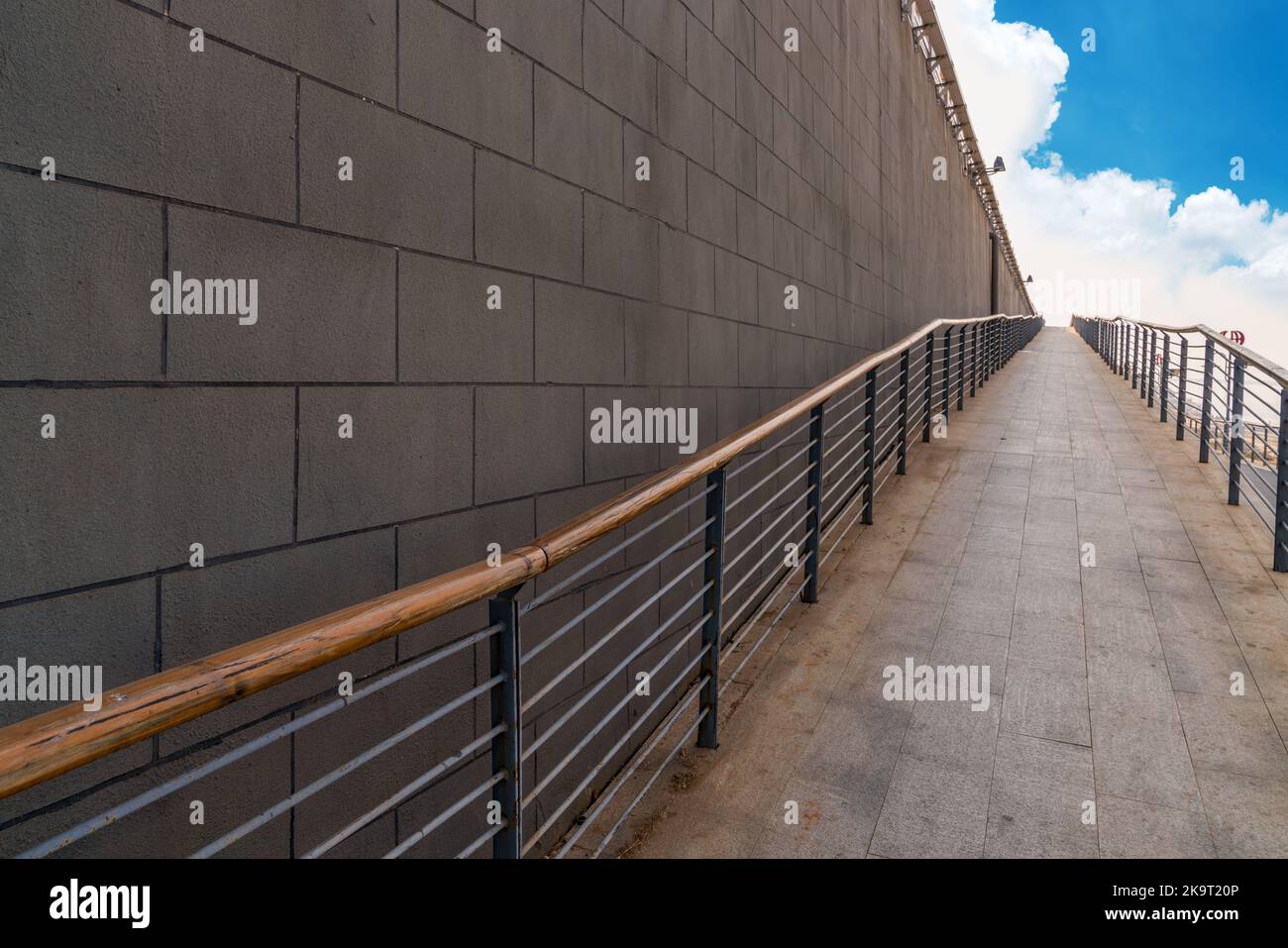 A wheelchair ramp, an inclined plane installed in addition to or ...