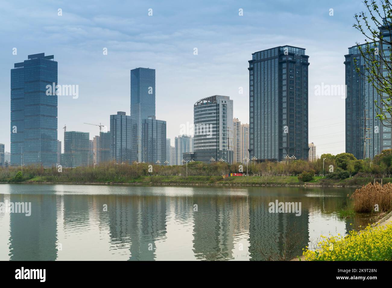 Lakeside modern office building in China Stock Photo - Alamy
