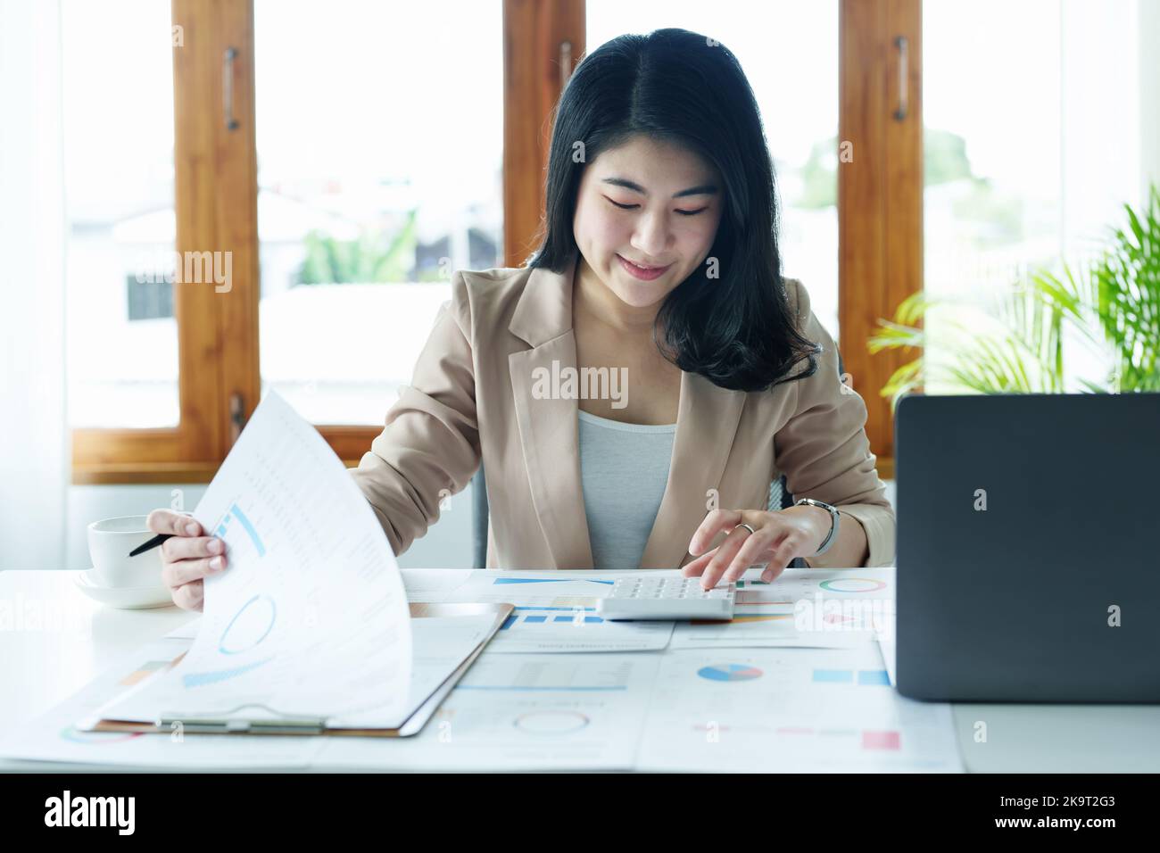 Accountants, Asian auditors are using calculators and computers to ...