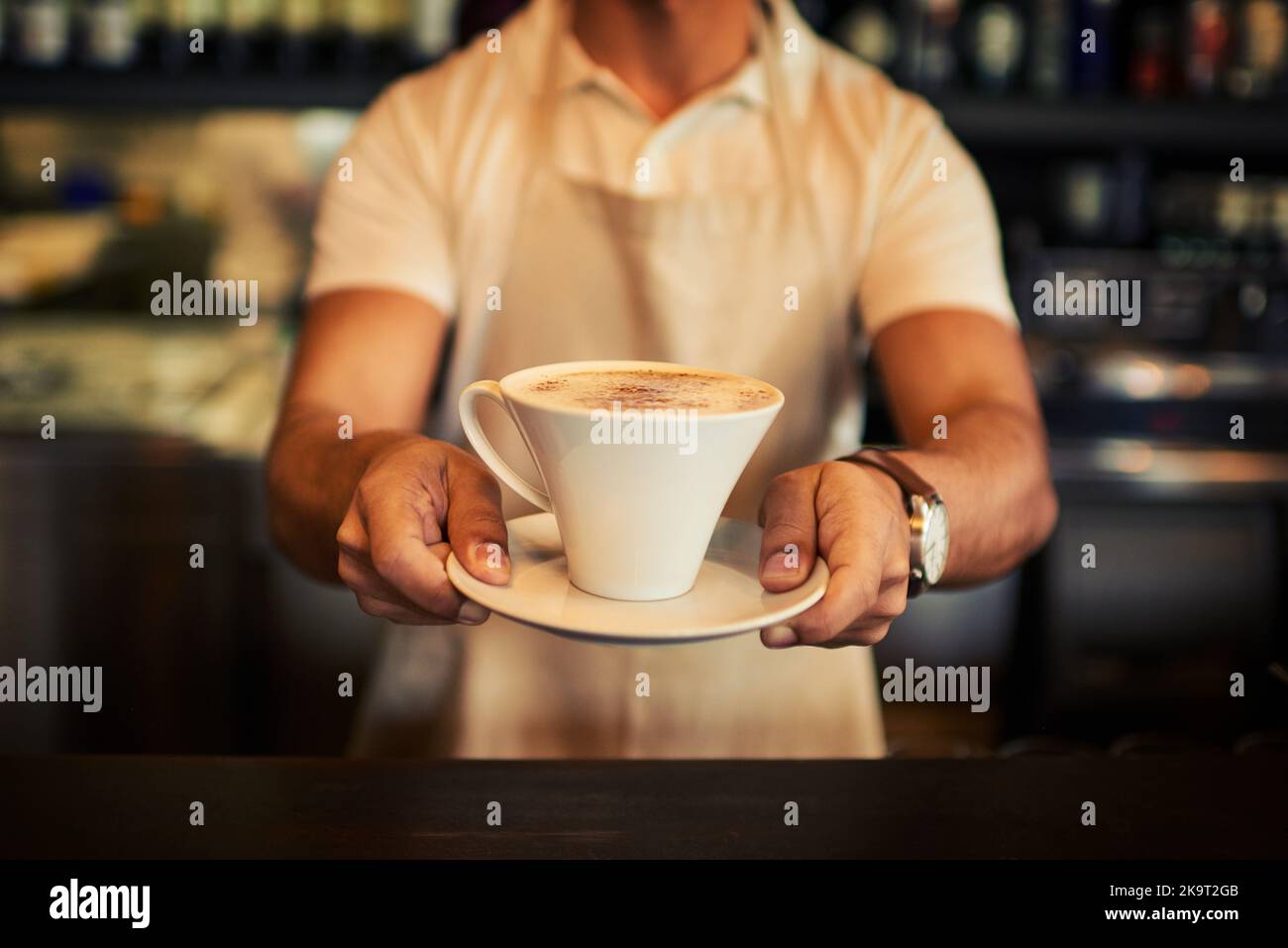 Heres your coffee sir. Closeup of an unrecognizable man holding a ...