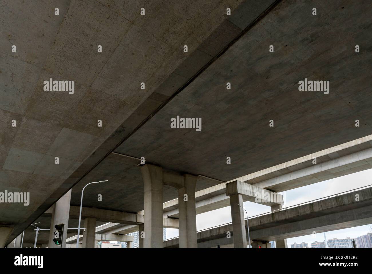Concrete structure and asphalt road space under the overpass in the ...