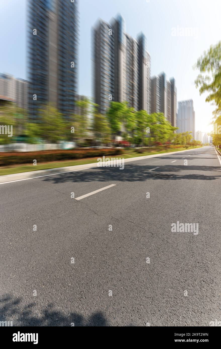 Empty urban road and buildings in China Stock Photo - Alamy