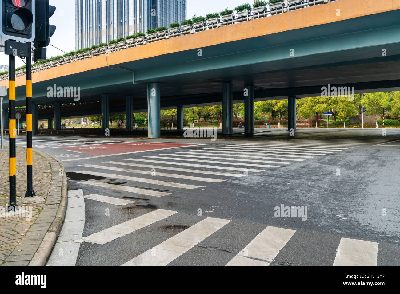 Concrete structure and asphalt road space under the overpass in the ...
