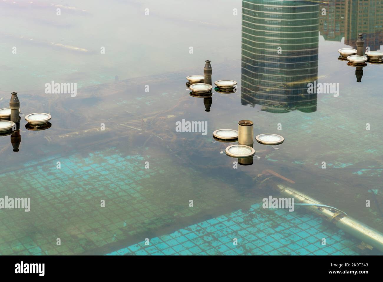 pipe system and lights in an empty fountain Stock Photo - Alamy
