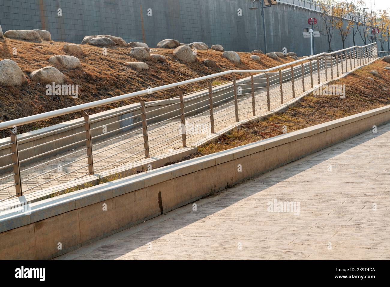 A wheelchair ramp, an inclined plane installed in addition to or ...