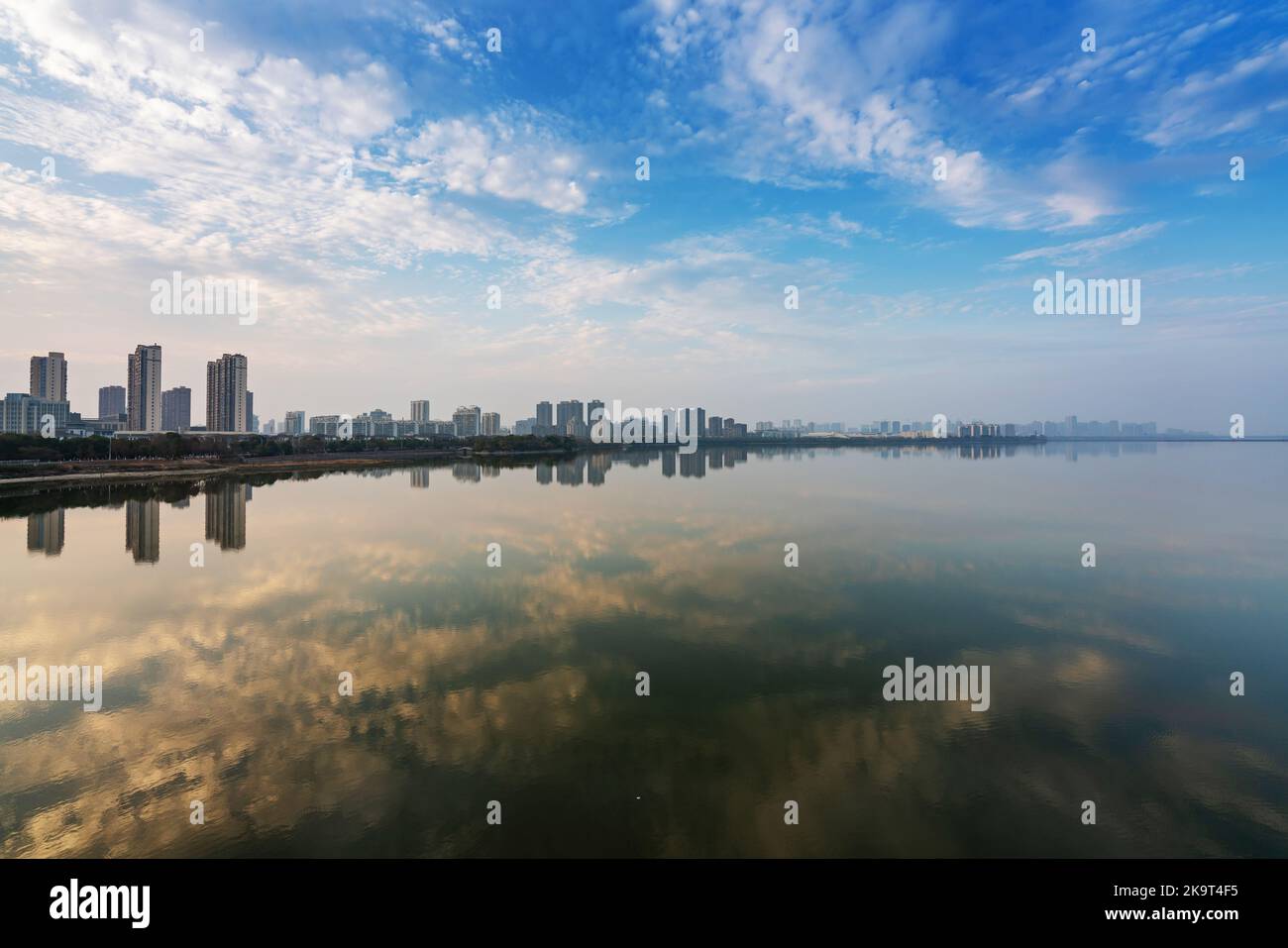 Lakeside modern office building in China Stock Photo - Alamy