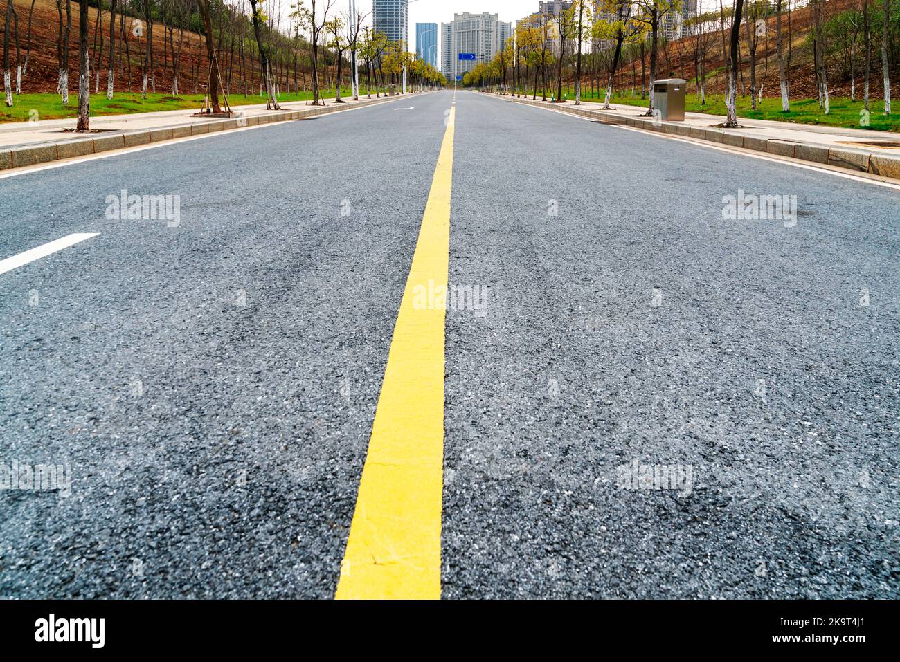 Empty urban road and buildings in China Stock Photo - Alamy