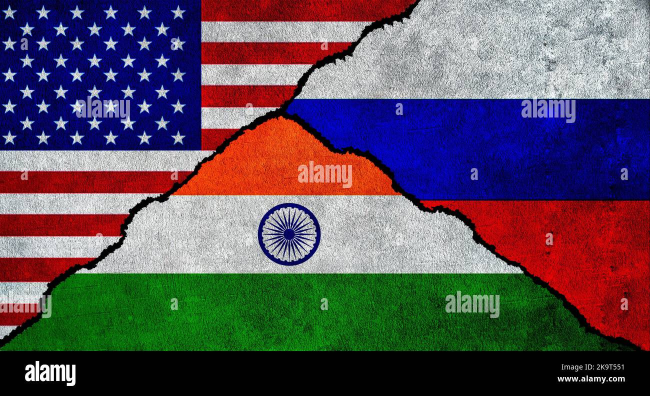 USA, India and Russia flag together on a textured wall. Relations ...