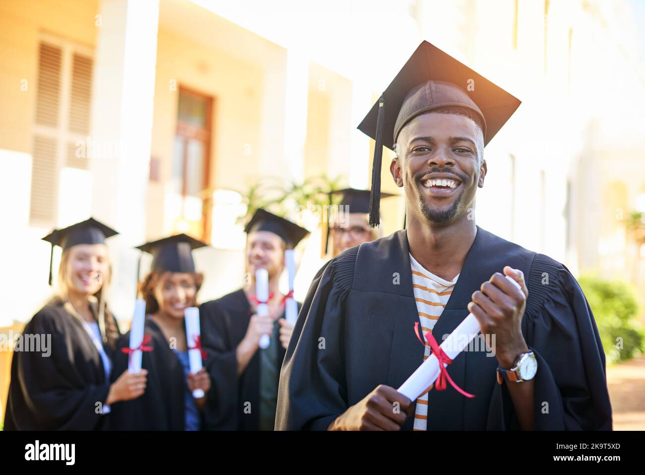 Portrait man wearing graduation cap hi-res stock photography and images ...