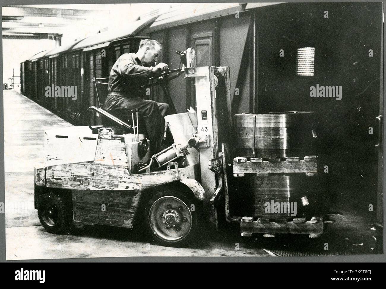 Loading of freight wagons at SKF Bångbro Stock Photo - Alamy