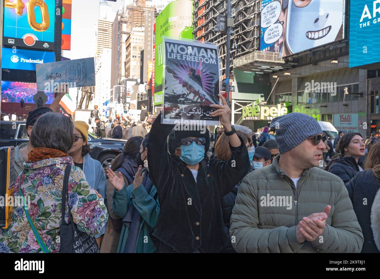 NEW YORK, NEW YORK - OCTOBER 29: A protester holds a "WOMAN LIFE ...