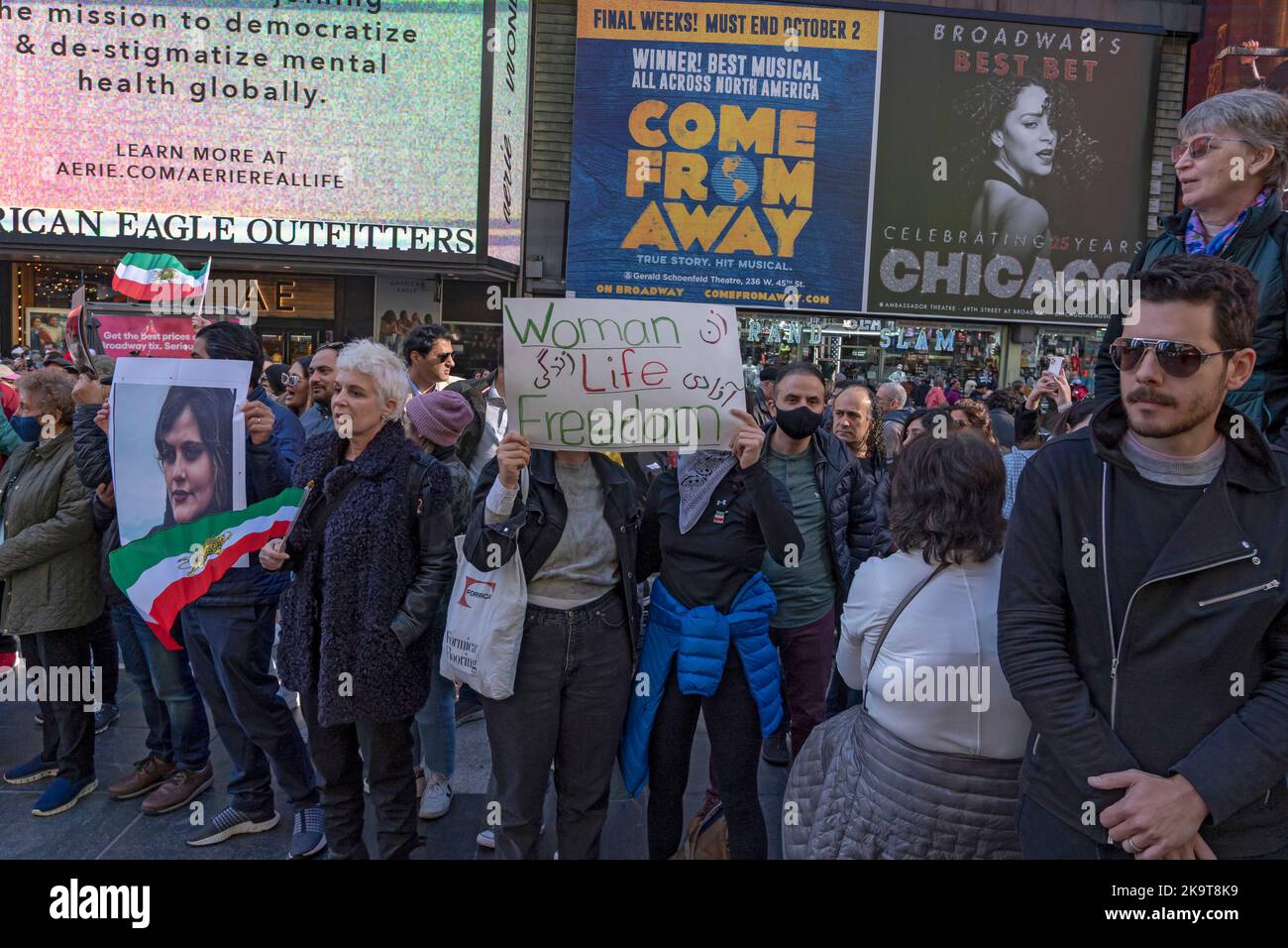 NEW YORK, NEW YORK - OCTOBER 29: A protester holds a "WOMAN LIFE ...