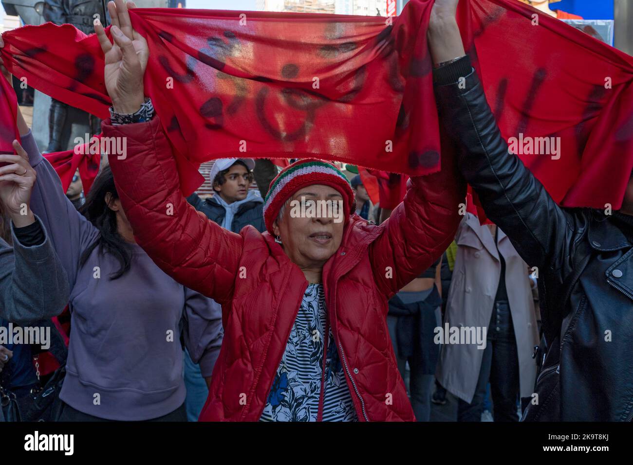 NEW YORK, NEW YORK - OCTOBER 29: Emotional protesters sing during a ...