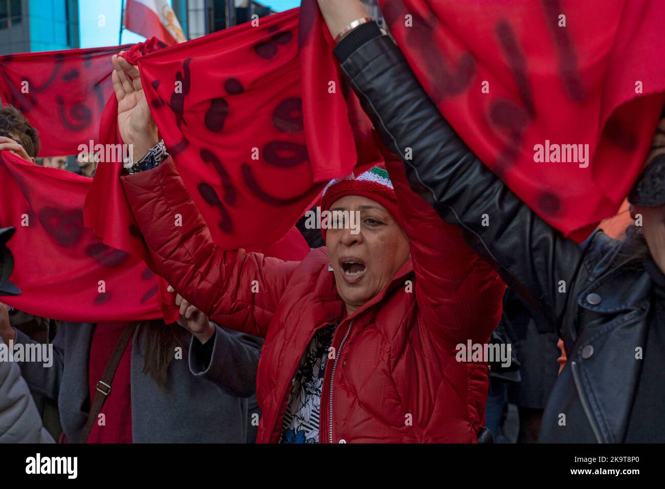 NEW YORK, NEW YORK - OCTOBER 29: Emotional protesters sing during a ...