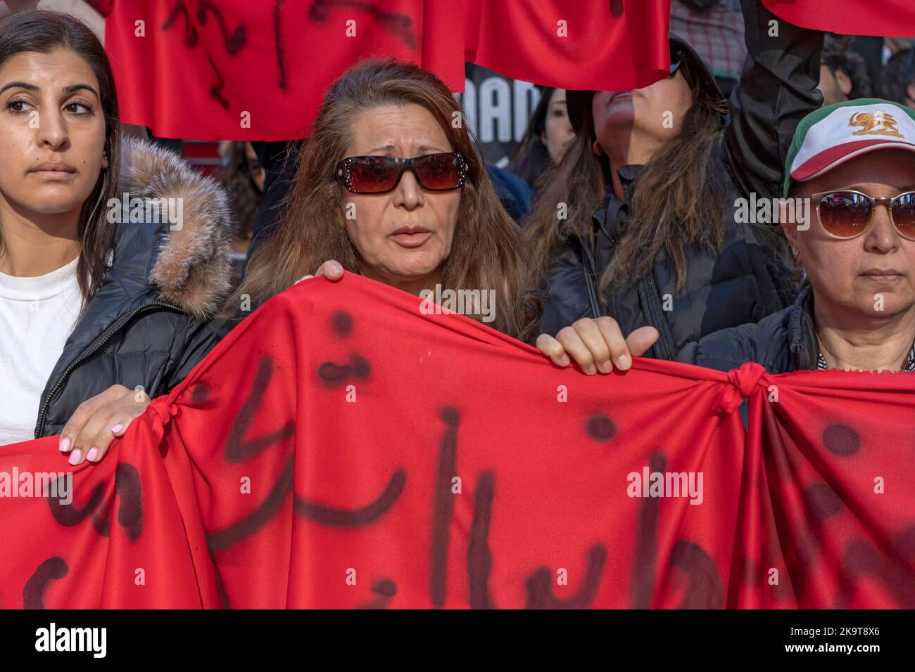 NEW YORK, NEW YORK - OCTOBER 29: Emotional protesters sing during a ...