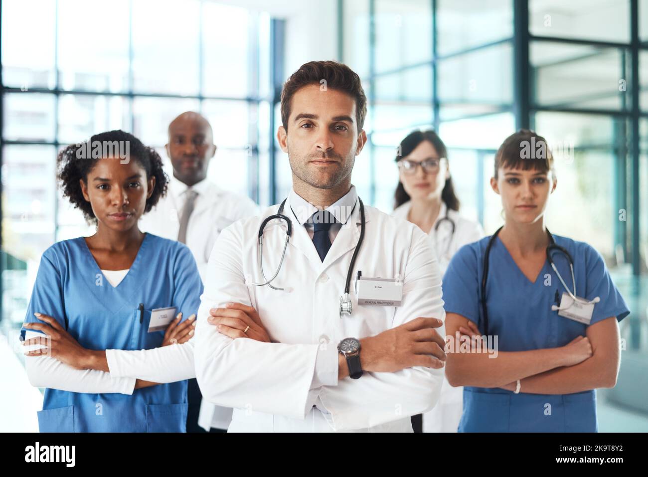 We dont stop until youre well again. Portrait of a diverse team of ...