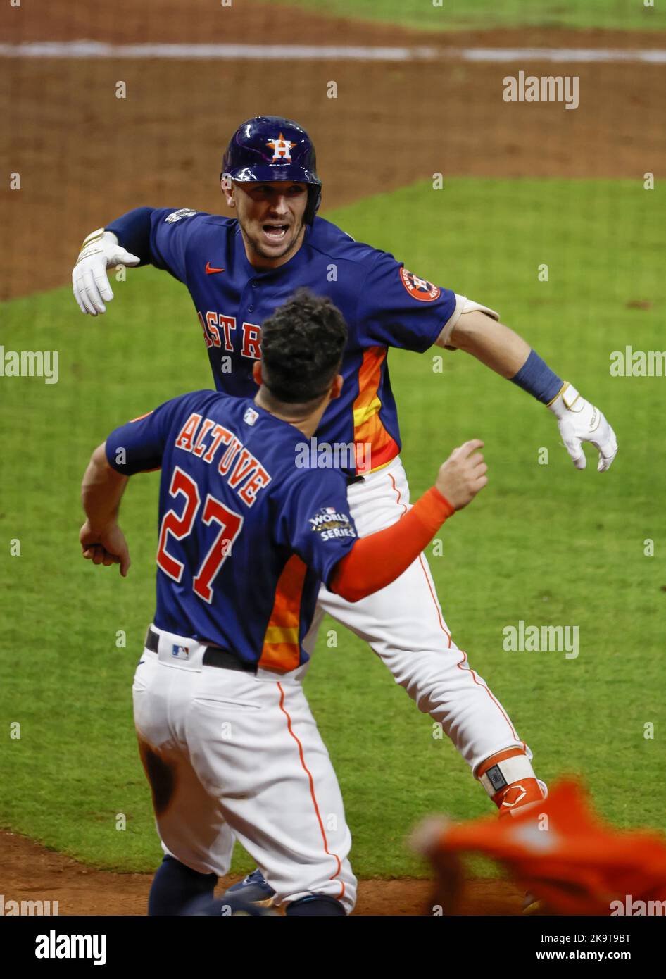 Alex Bregman of the Houston Astros celebrates with teammate Jose Altuve ...