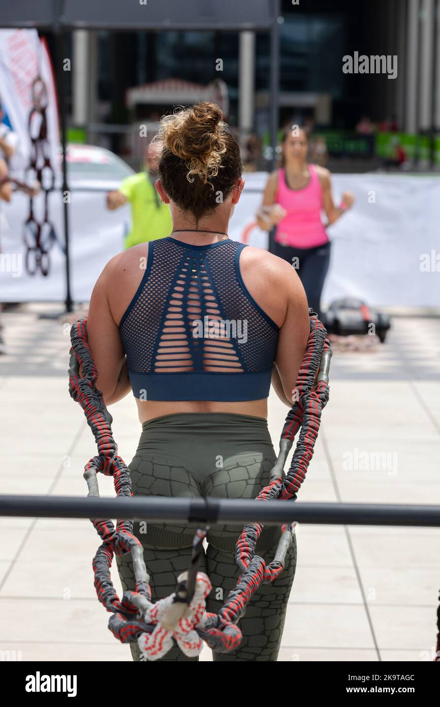Girl Having Fitness Workout with Rope in an Outdoor Gym Stock Photo - Alamy