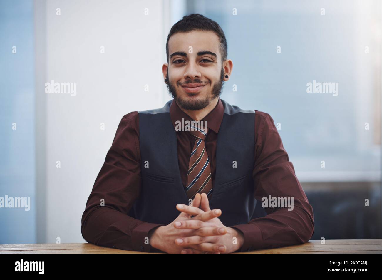 Never stop truly believing in yourself. Portrait of a young businessman ...