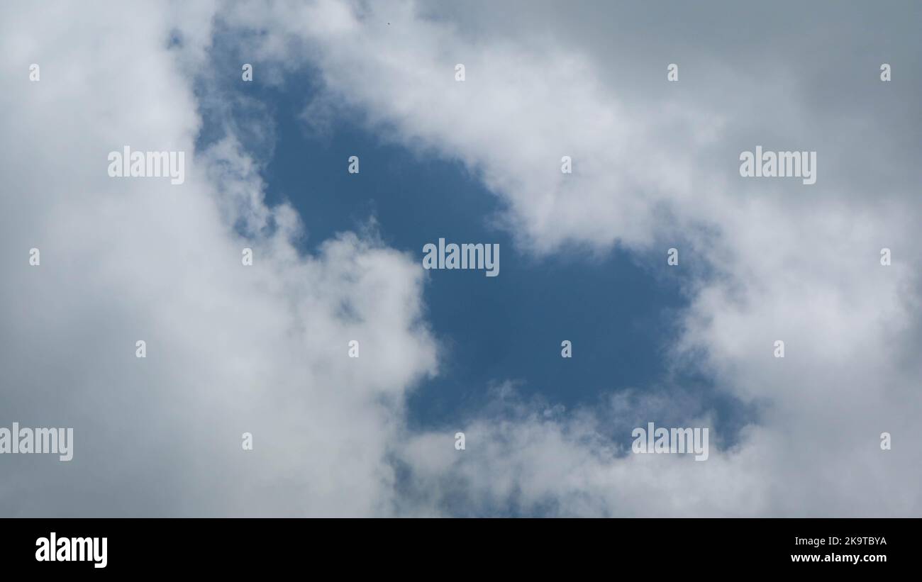 blue cloudy sky as background Stock Photo - Alamy