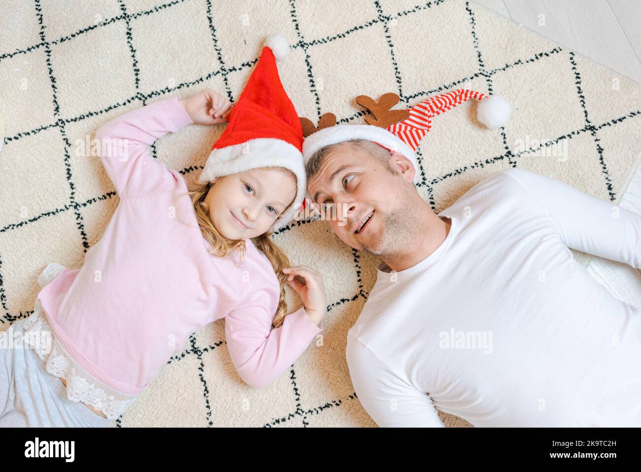 Father daughter santa hats hi-res stock photography and images - Alamy