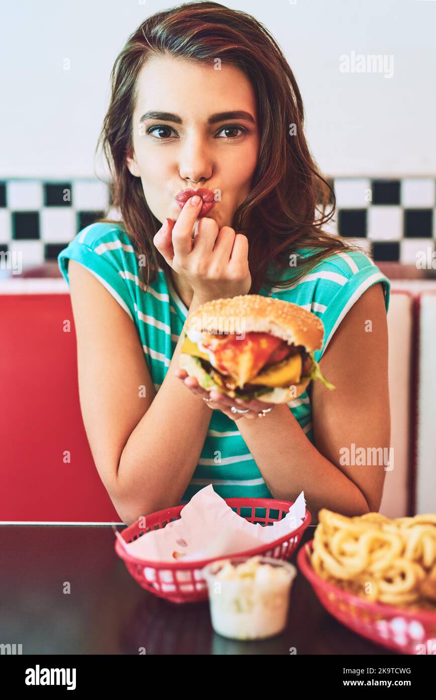 Perfection. Cropped portrait of an attractive young woman enjoying a ...