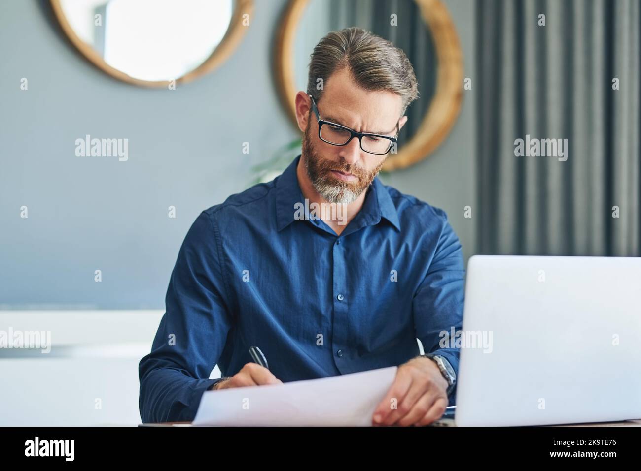 Making sure everything is correct and ready for the office. a focussed ...