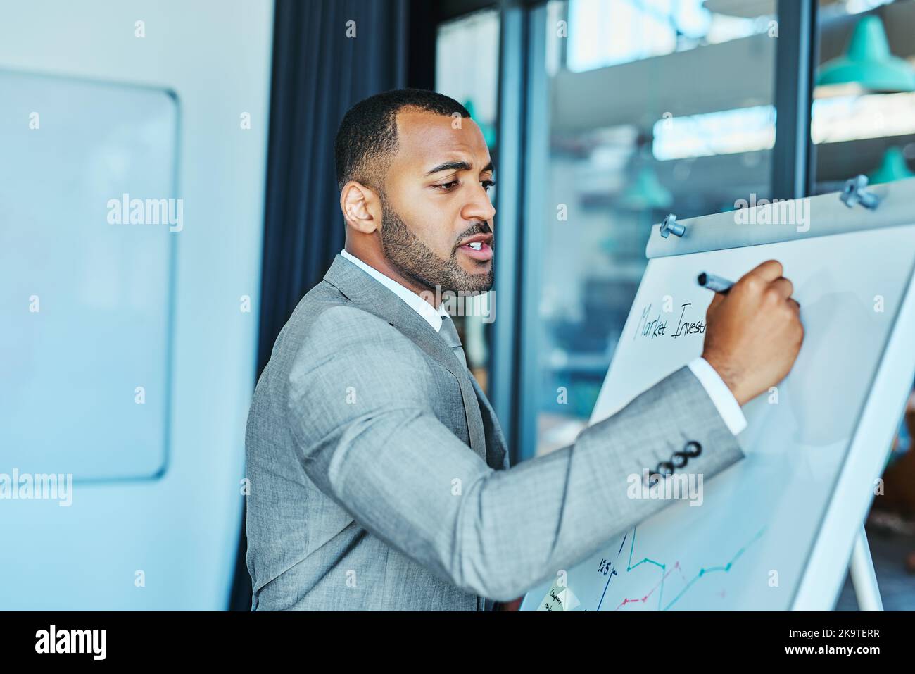 Business people writing on white board hi-res stock photography and ...
