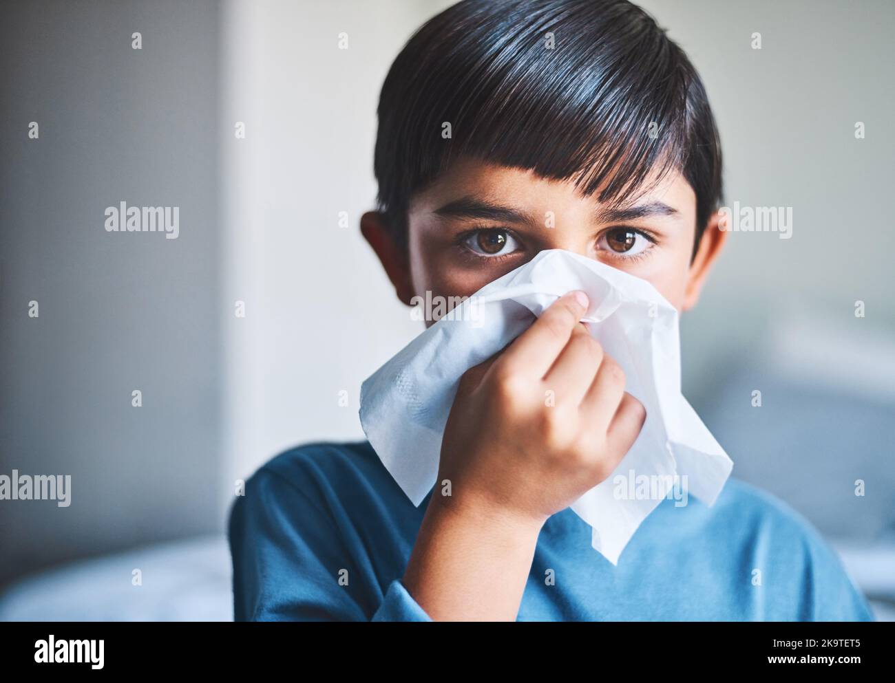 Ive got a bit of a runny nose. Cropped portrait of an adorable little ...