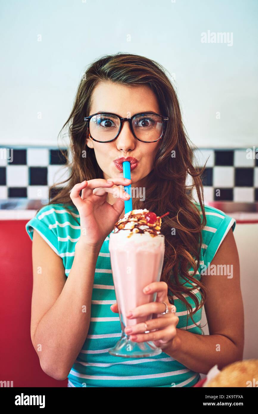 Ill risk the brain freeze. Cropped portrait of an attractive young ... Ill risk the brain freeze. Cropped portrait of an attractive young ...