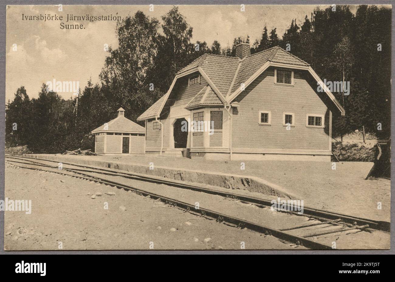 Track side of station with platform and buildings in the picture Stock ...