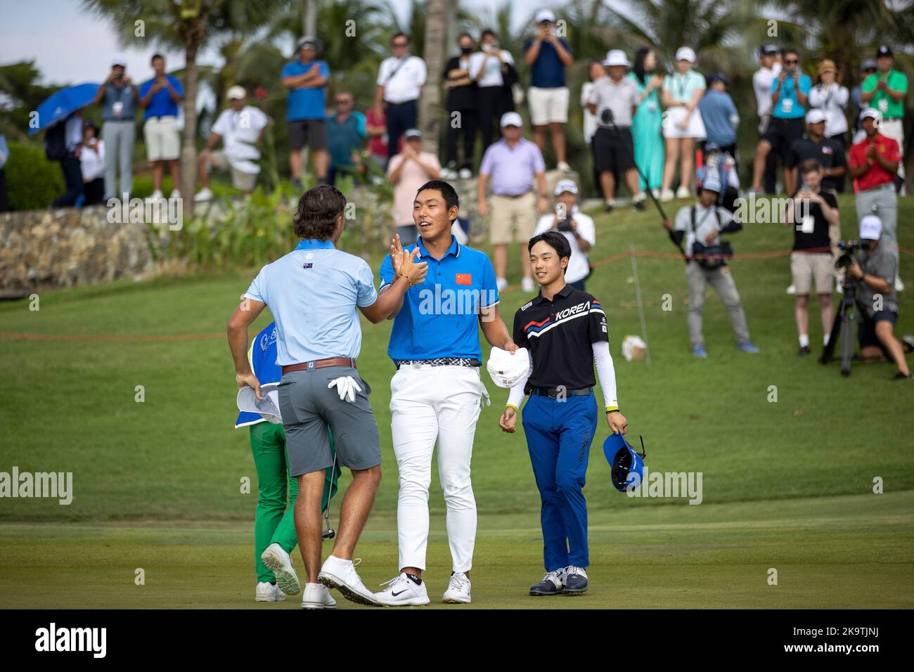 CHONBURI, THAILAND - OCTOBER 30: Bo Jin of China congratulates Harrison ...