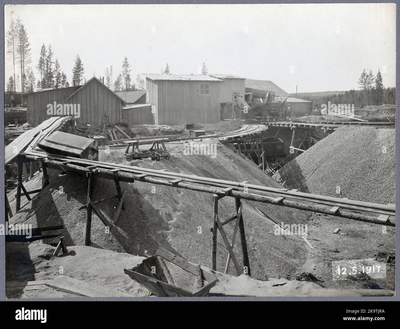 The macadam crusher with macadam warehouse on the Öre River Stock Photo - Alamy