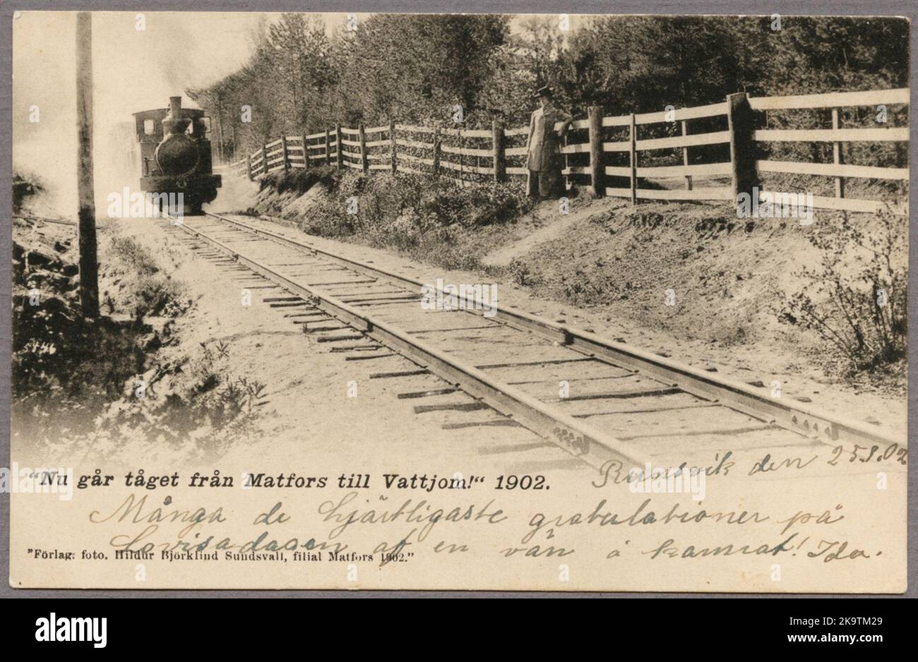 Railway line between Matfors and Vattjom with woman and traffic ...