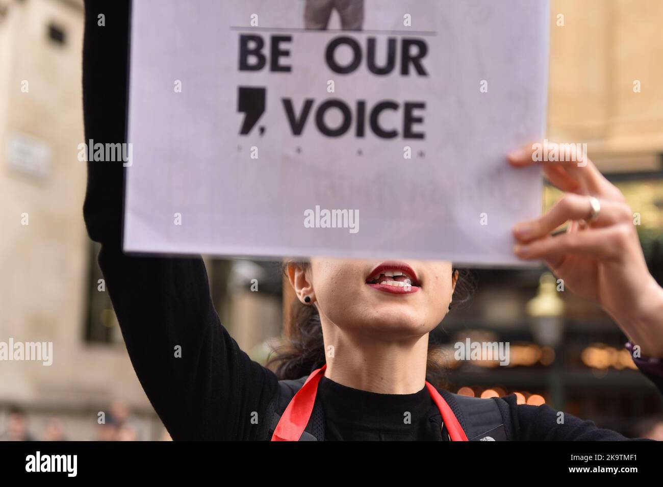 London, UK. 29th Oct, 2022. A protester chants slogans while holding a ...