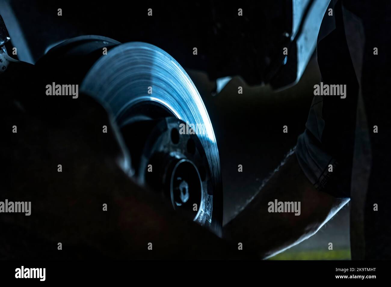 Mechanic hands detail during a maintenance of car brakes Stock Photo ...