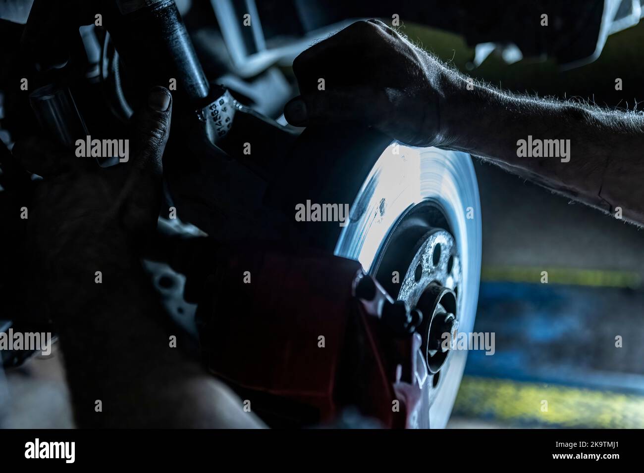 Mechanic hands detail during a maintenance of car brakes Stock Photo ...