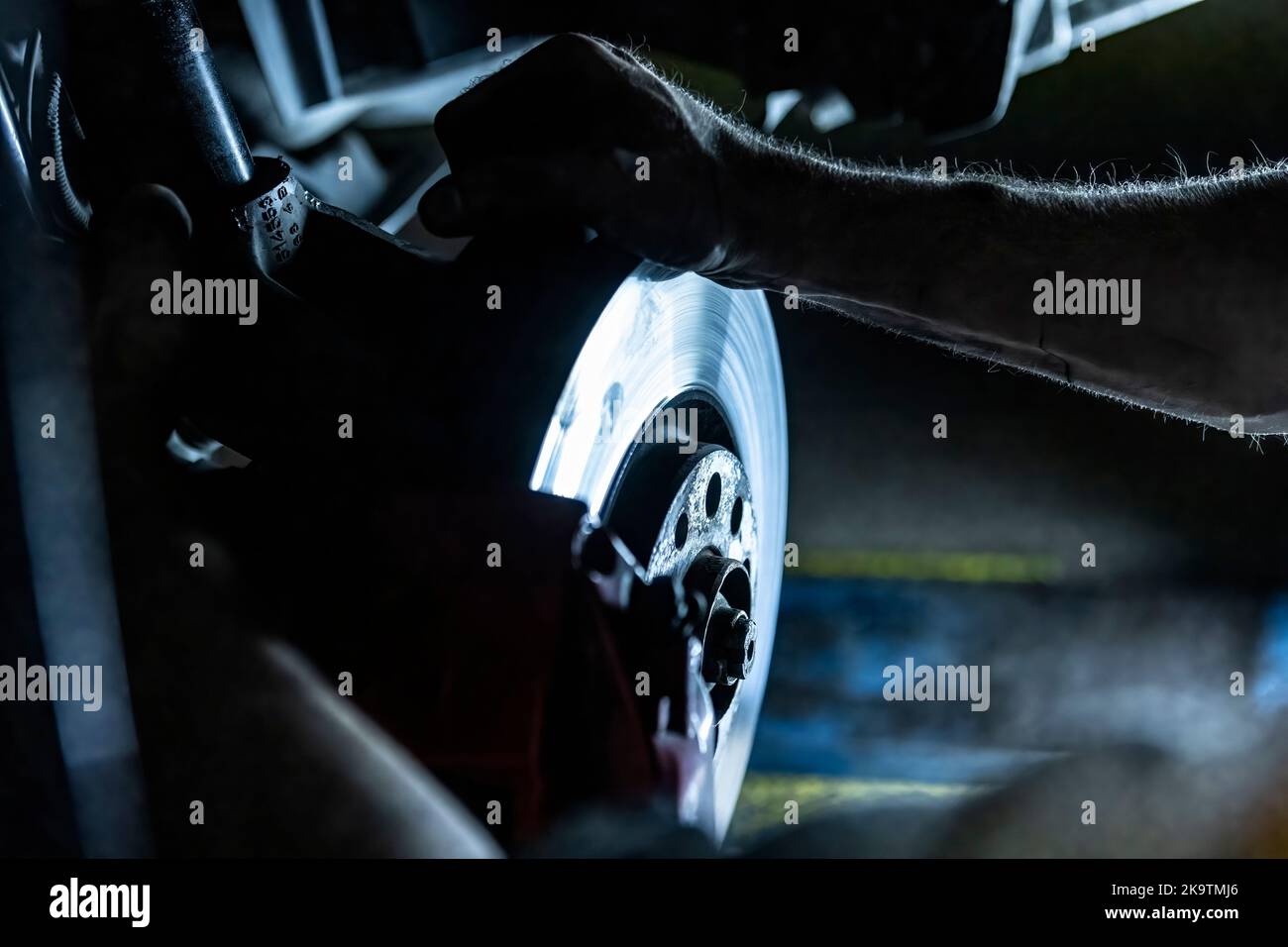 Mechanic hands detail during a maintenance of car brakes Stock Photo ...