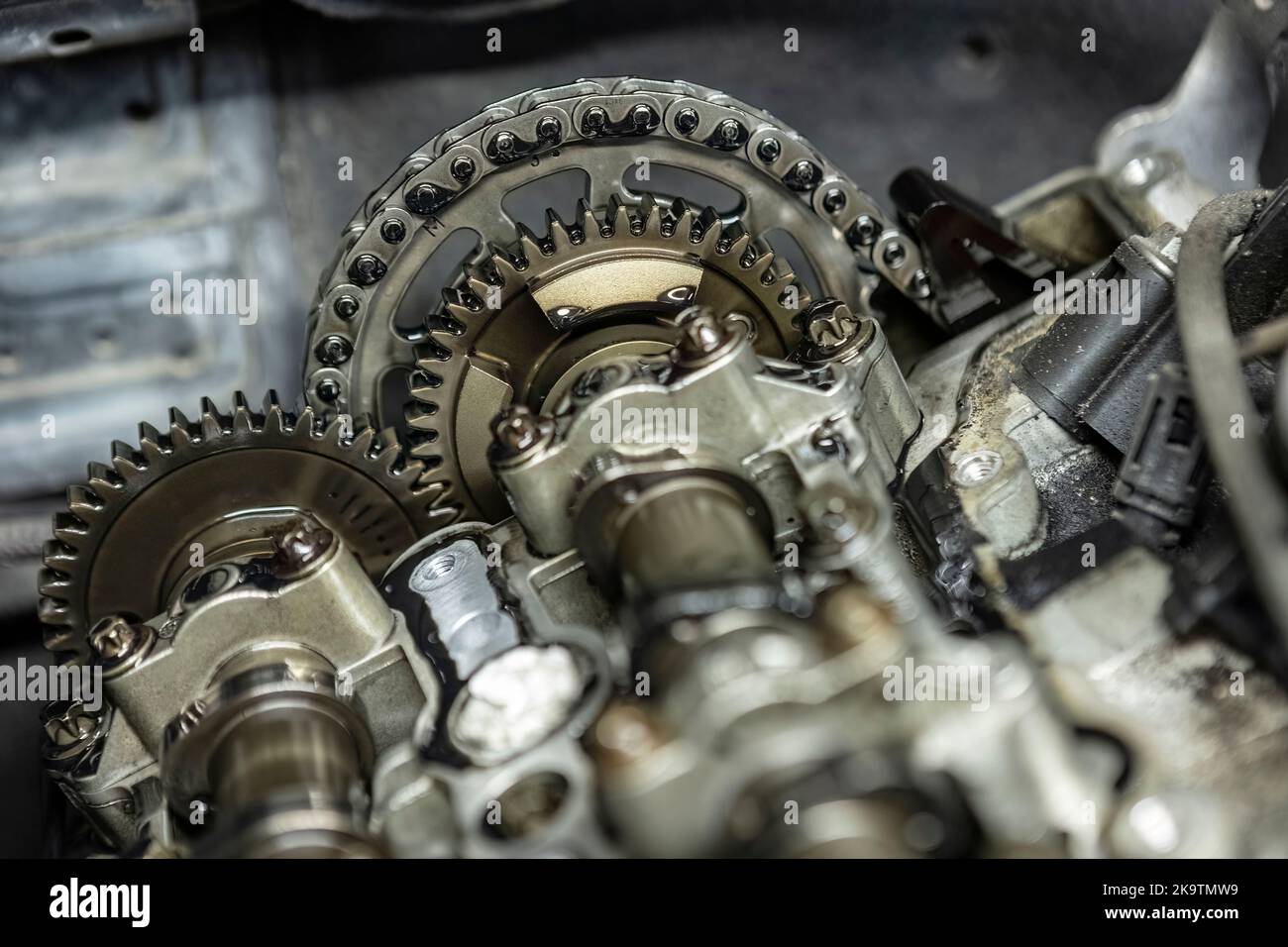Engine timing chain detail in a workshop during maintenance Stock Photo ...