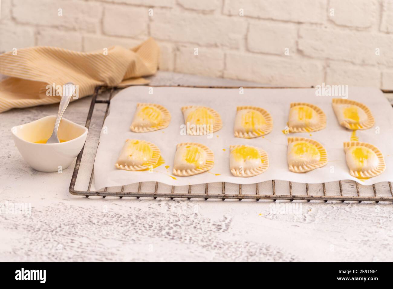Empanadillas , small filling tuna pies in roasting tray preparation to ...