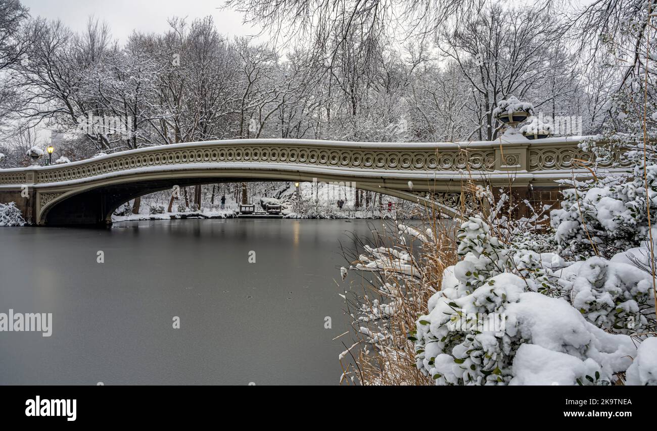 Bow bridge, Central Park, New York City during snow storm, or blizzard ...